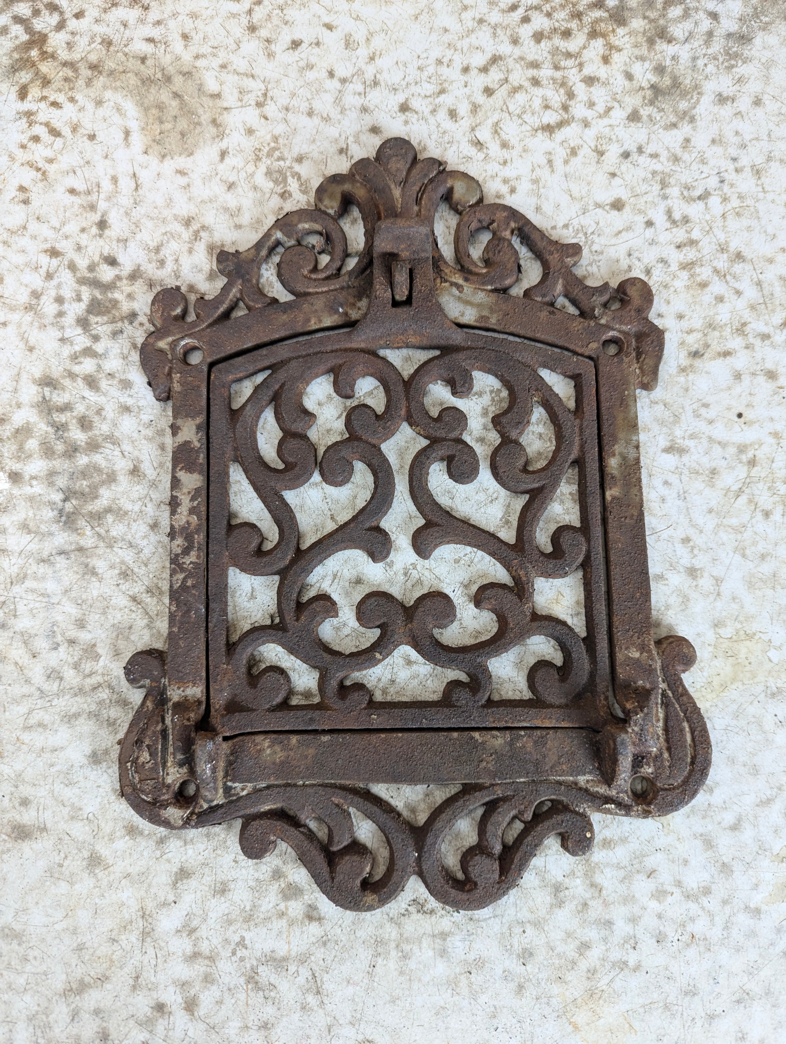 Antique Cast Iron Swing Arm Wall Trivet – KG Novelties